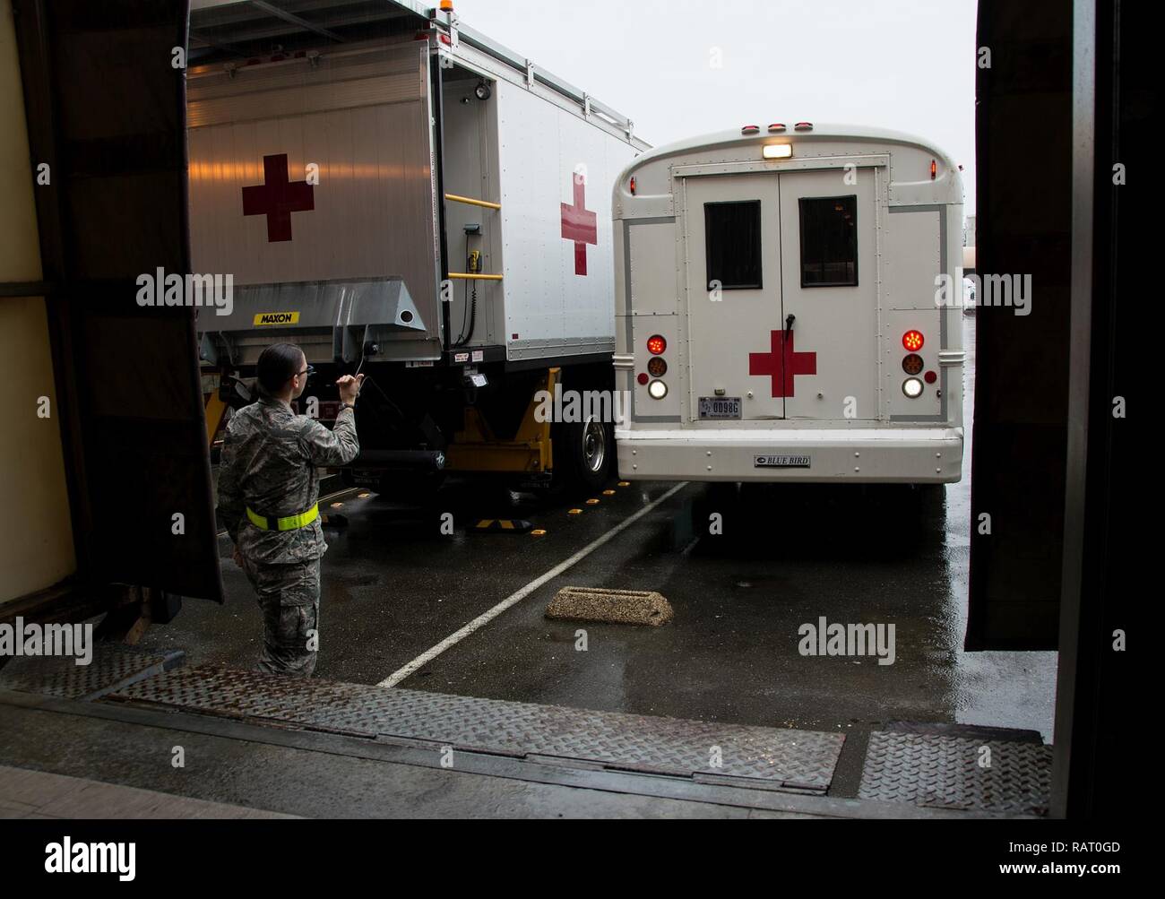 1st Lt. Andrea Nofi, 60th Inpatient Squadron nurse, guides an ambulance ...