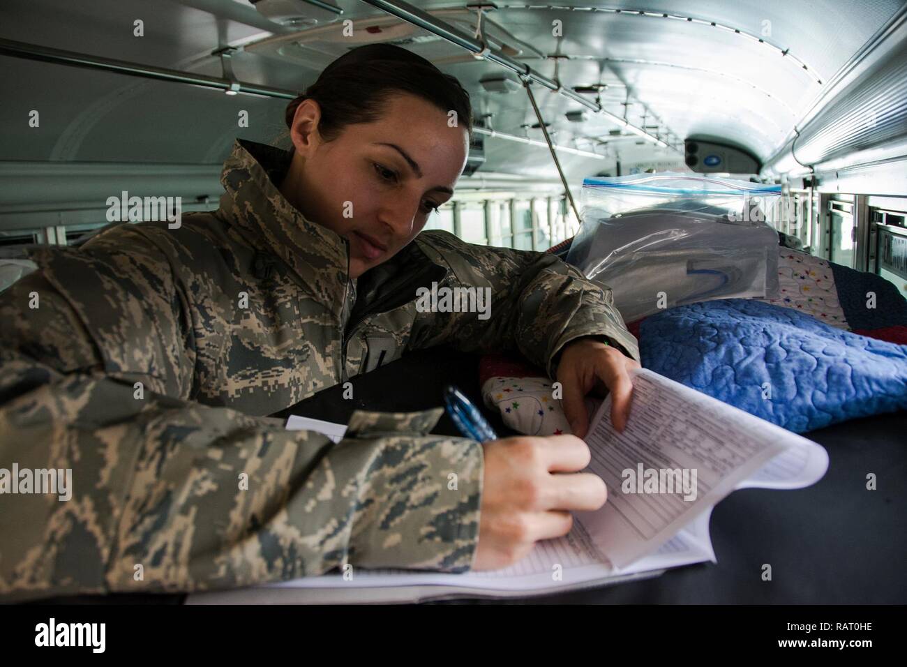 1st Lt. Christine Aye, 60th Inpatient Squadron nurse, goes over a ...