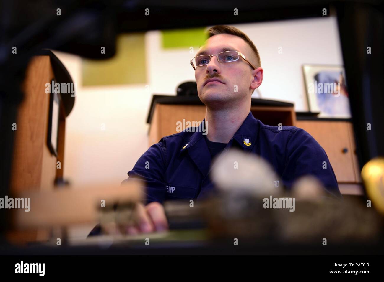 Coast Guard Petty Officer 2nd Class Michael Cody Kemp, a storekeeper ...