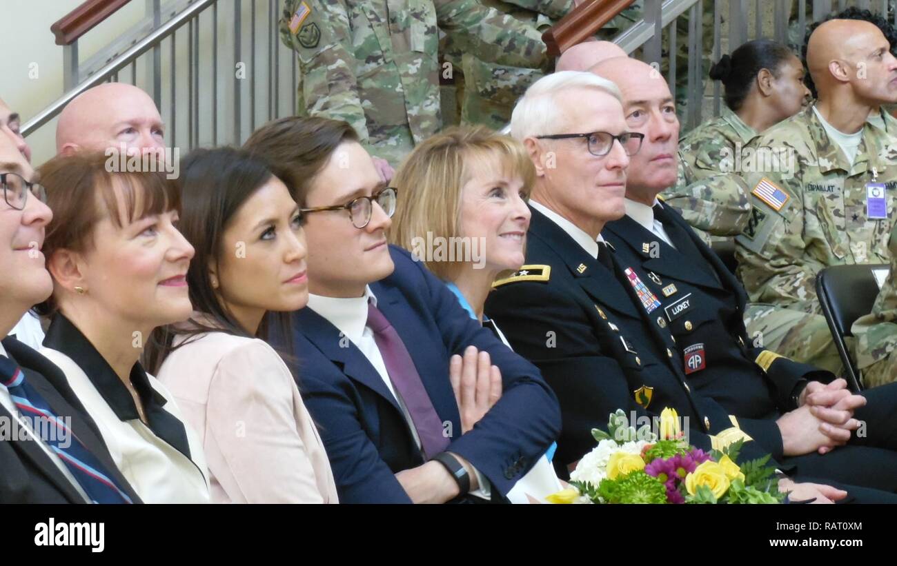Lennon, and his wife, Elaine, sit with LTG Charles D. Luckey, chief of ...