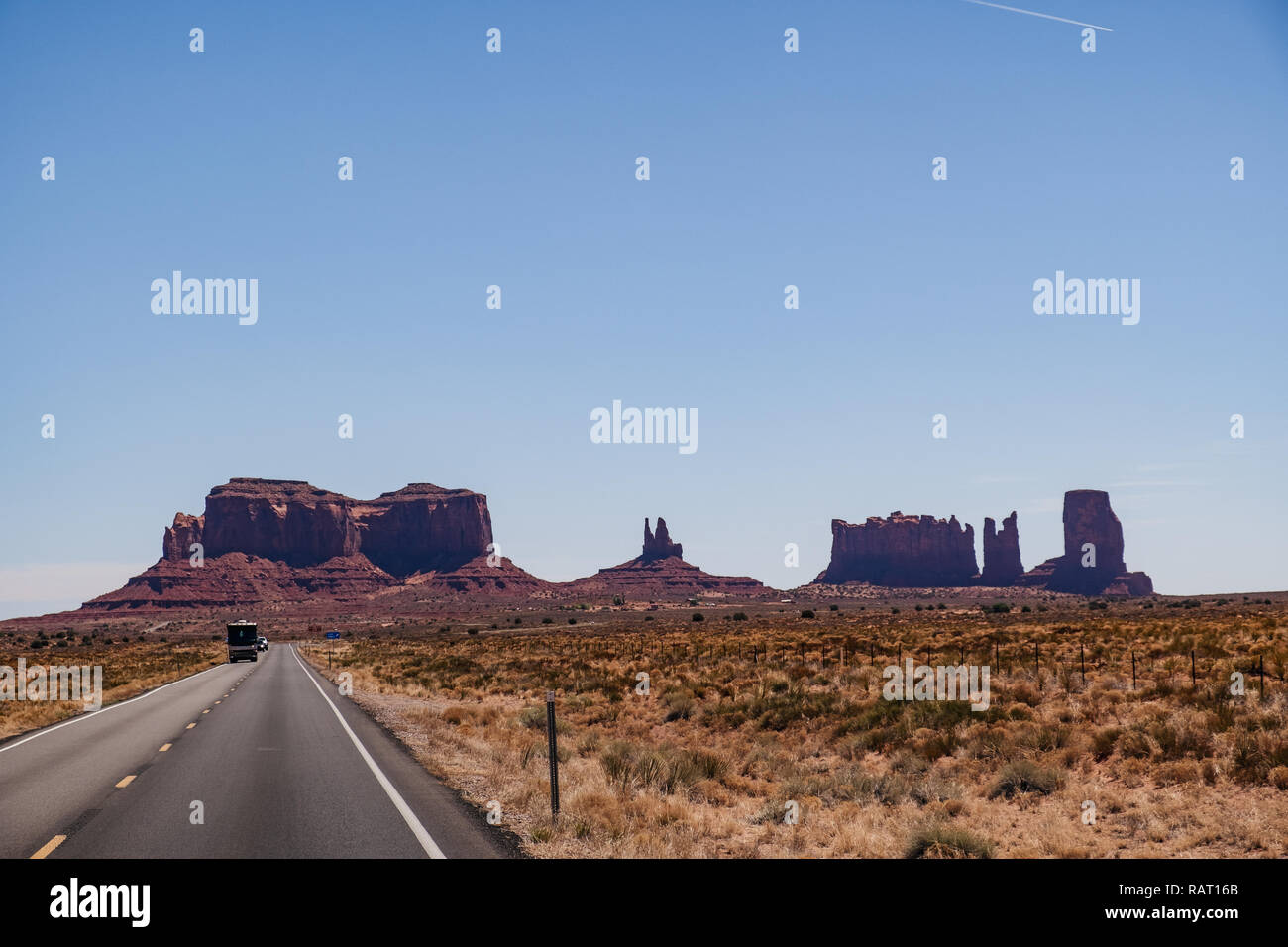 Red sandstone towering buttes known as Monument Valley on the Arizona ...