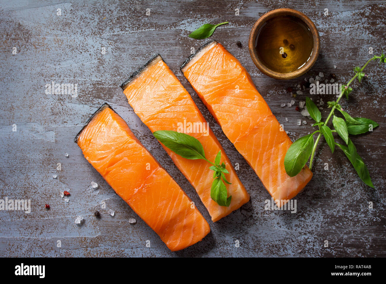 Fresh Fish. Raw Salmon Fillet on a dark metallic background. Top view ...