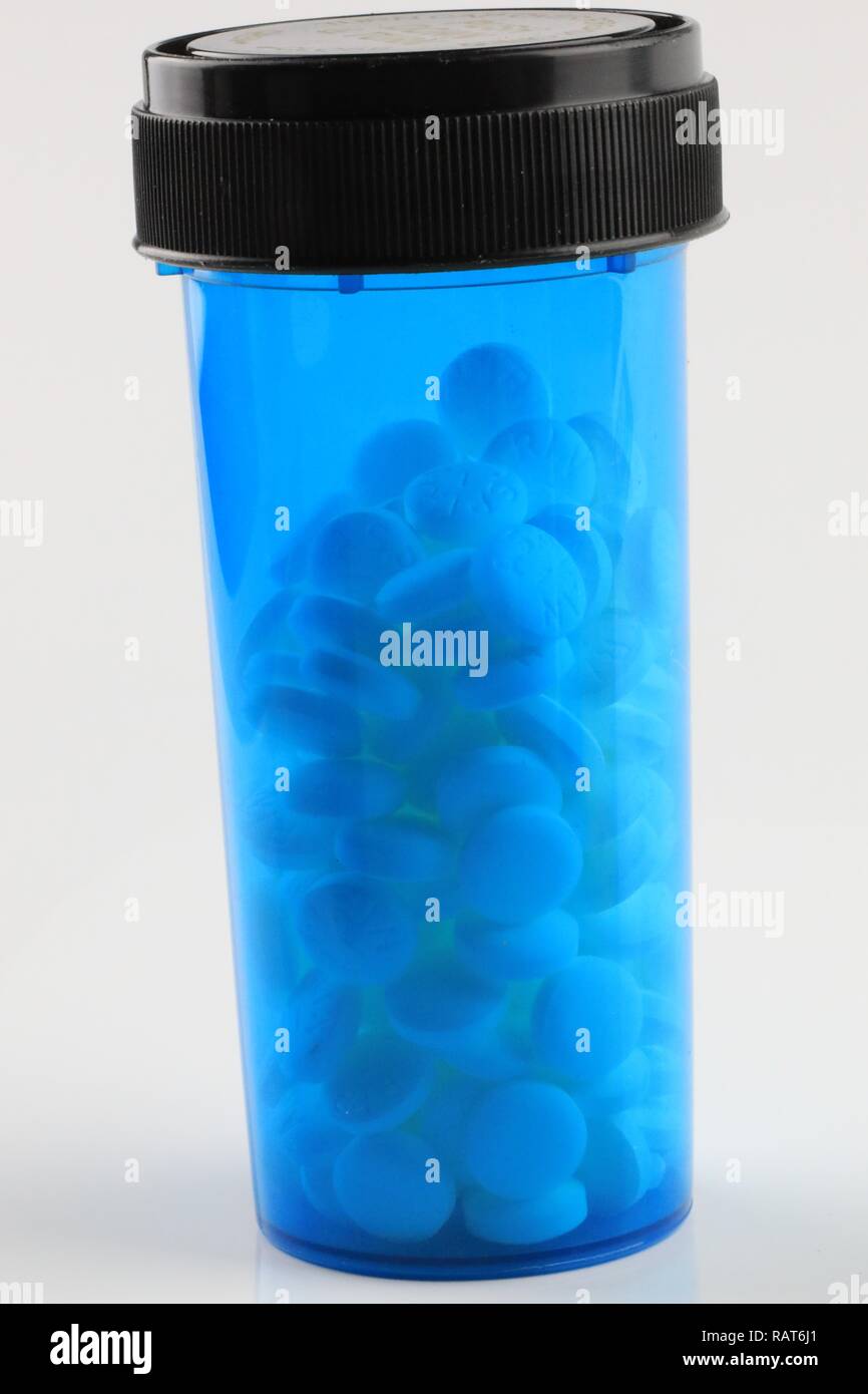 Medication pills and bottle Stock Photo - Alamy