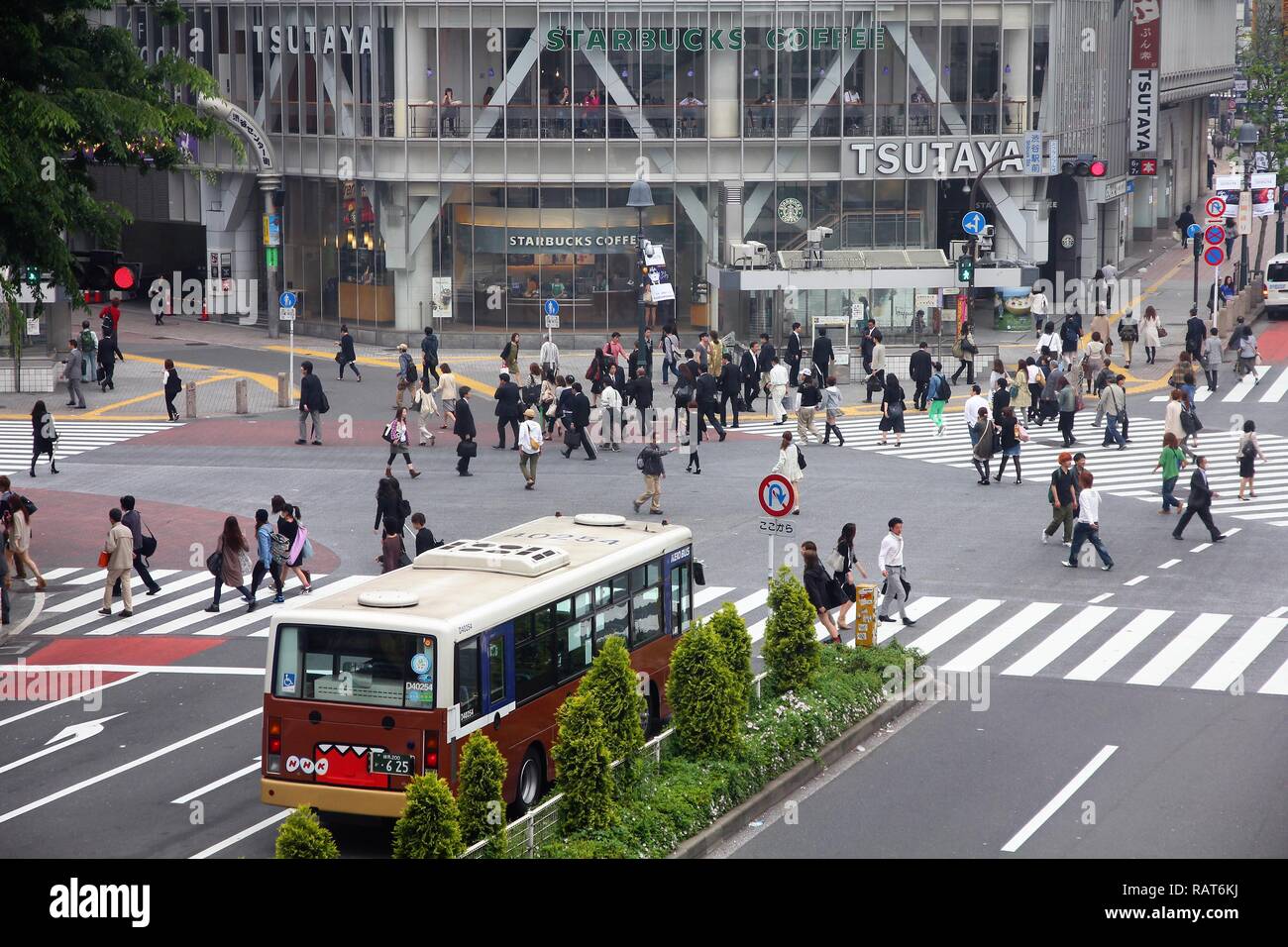 TOKYO, JAPAN - MAY 9, 2012: People walk the famous Hachiko crossing in ...