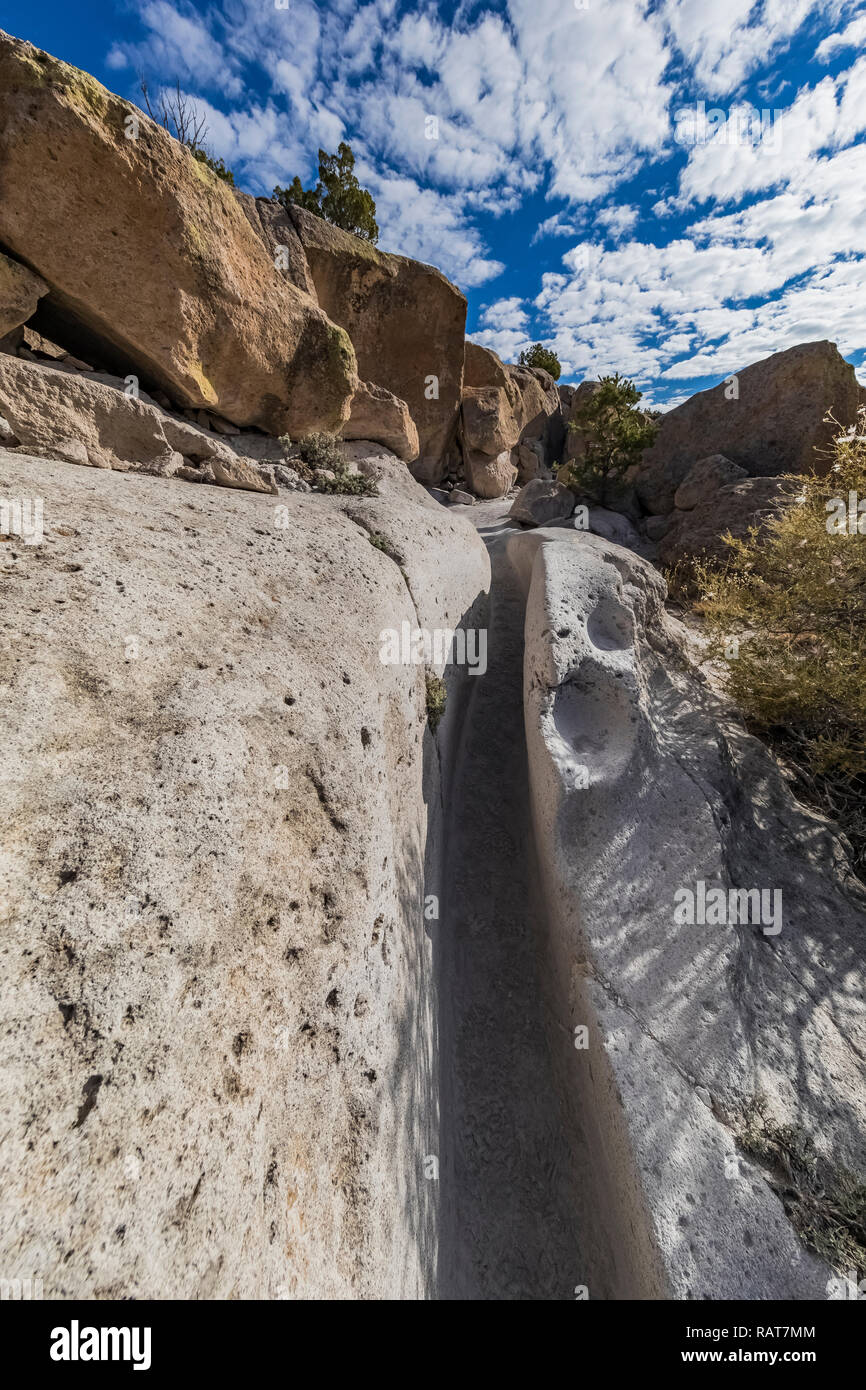 Trail cut into soft volcanic tuff rock by footwear through the years ...