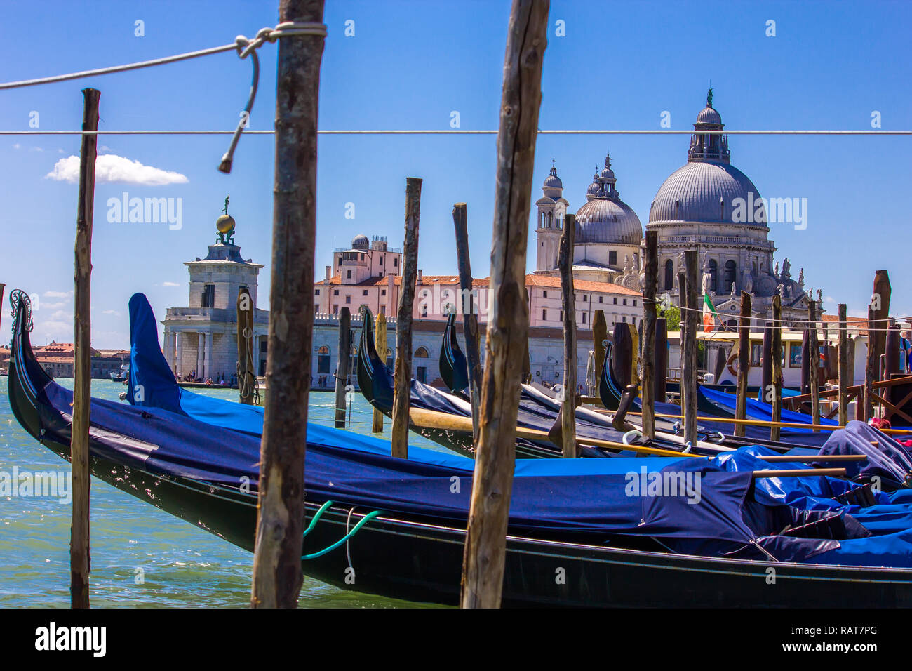 Gondola boats in Venice Italy with view of Basilica Santa Maria della ...