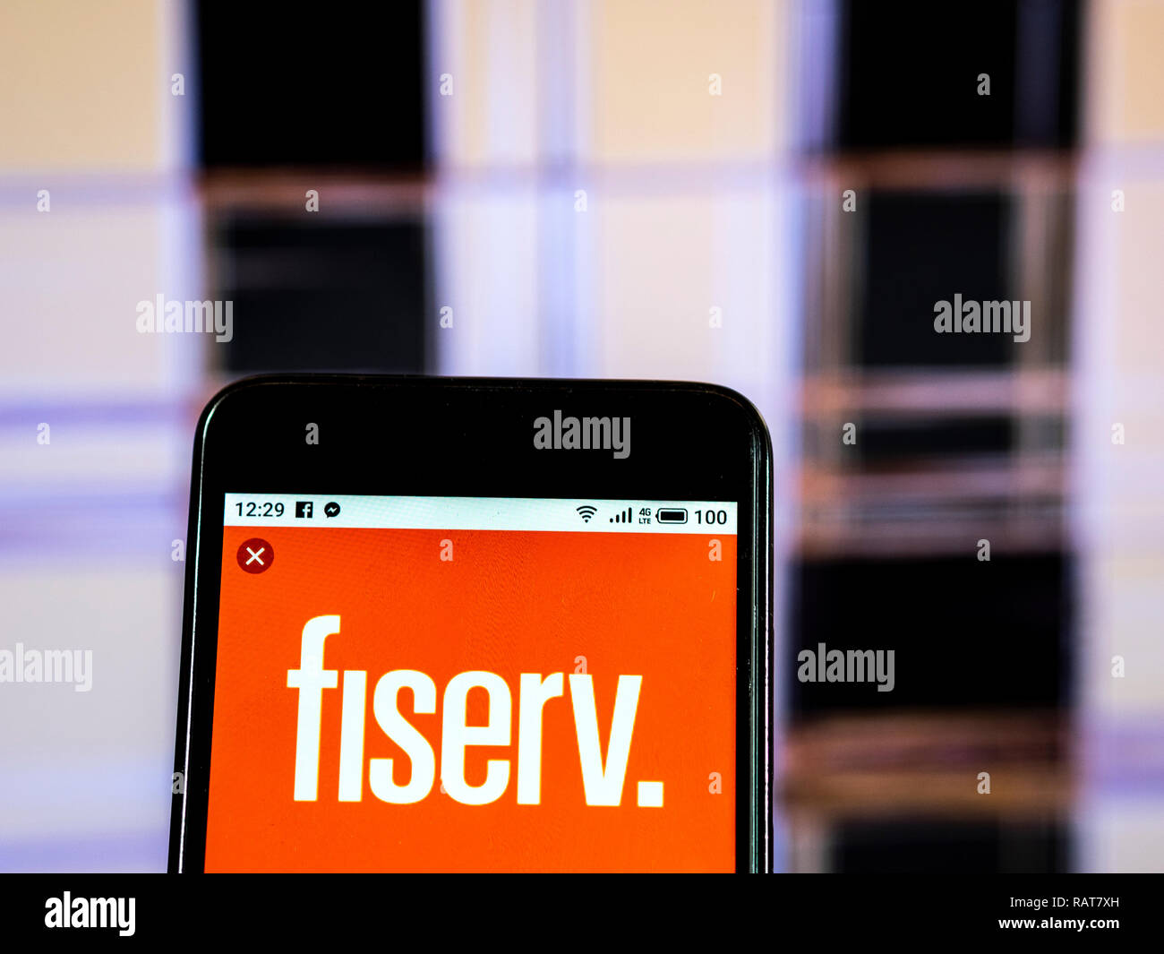 Fiserv Company logo seen displayed on smart phone Stock Photo - Alamy