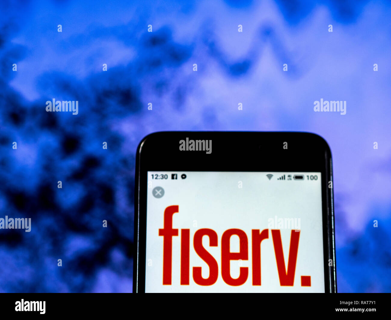 Fiserv Company logo seen displayed on smart phone Stock Photo - Alamy
