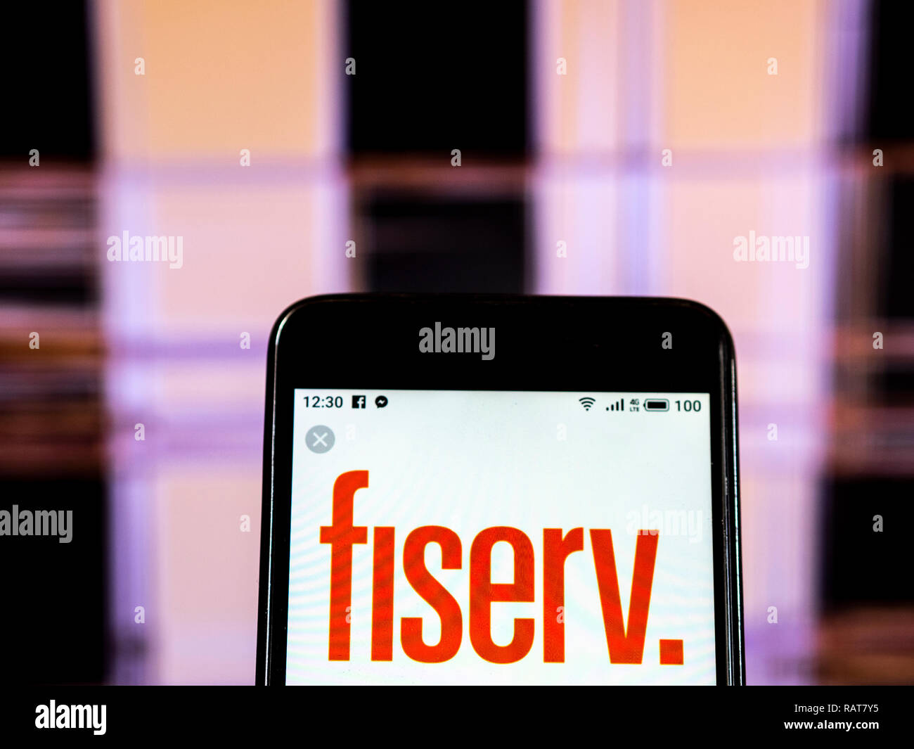 Fiserv Company logo seen displayed on smart phone Stock Photo - Alamy