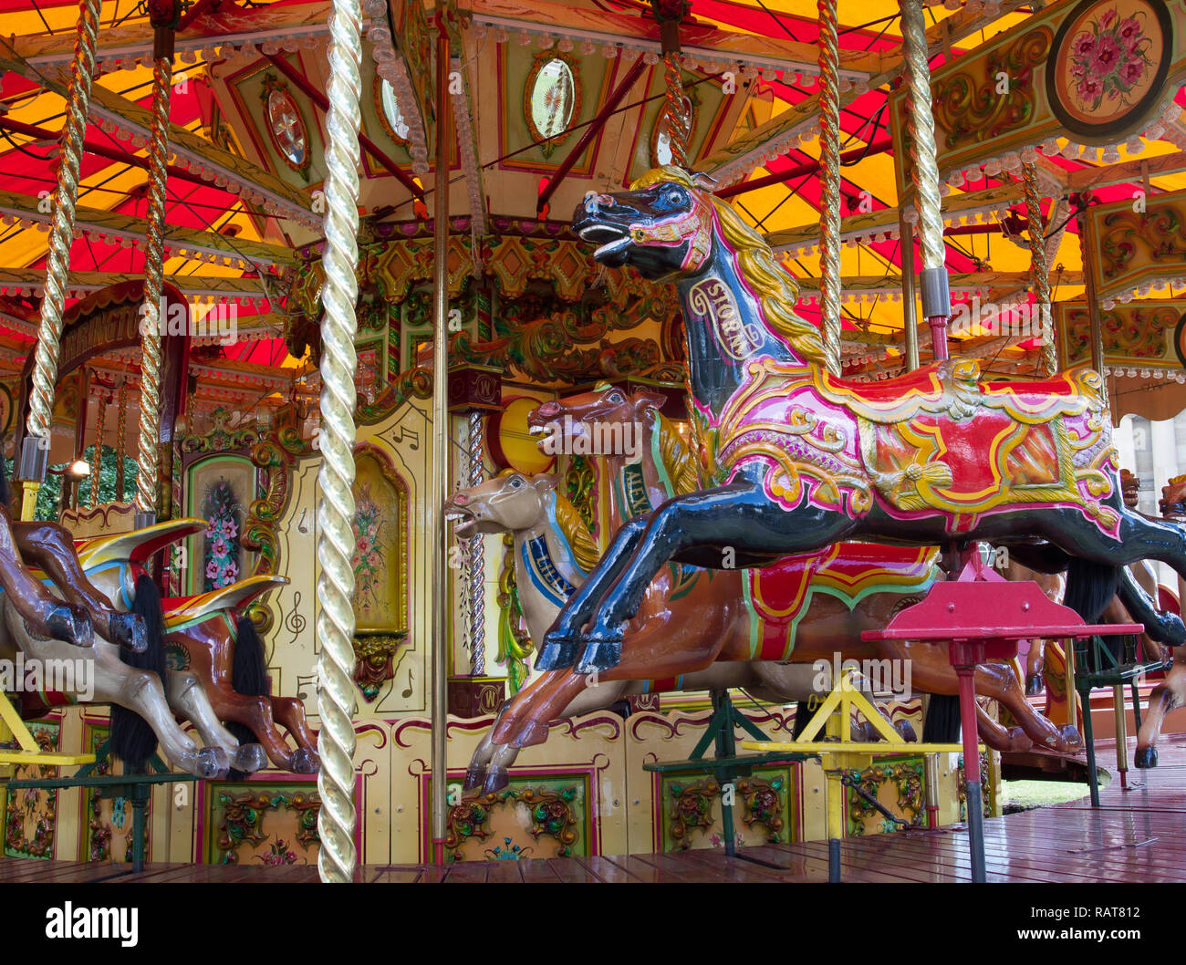 Children fairground carousel horses hi-res stock photography and images ...