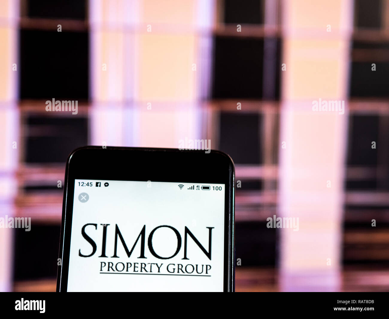 Simon Property Group Real estate company logo seen displayed on smart ...