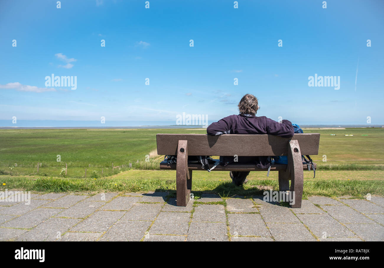 Person on bench hi-res stock photography and images - Alamy