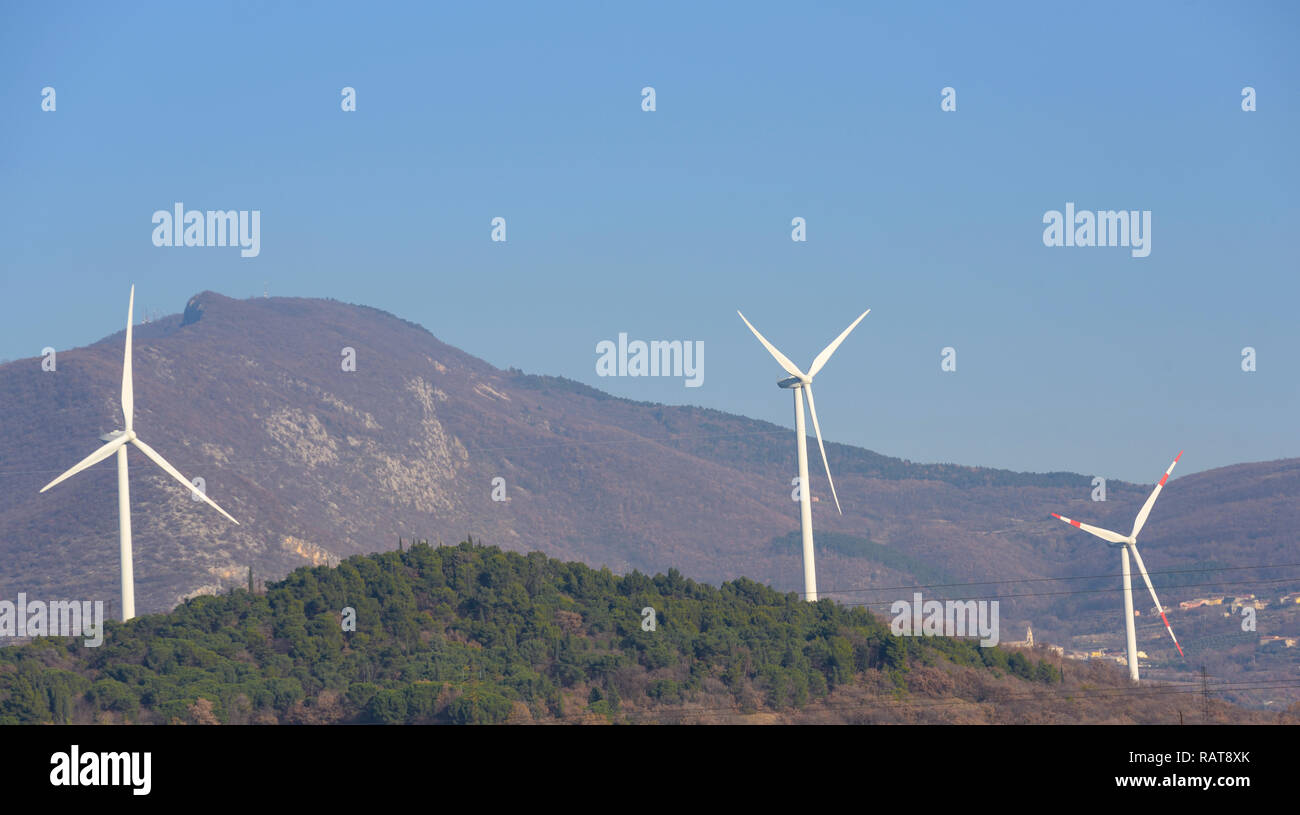 Wind turbines on mountains. Production of clean and renewable energy ...
