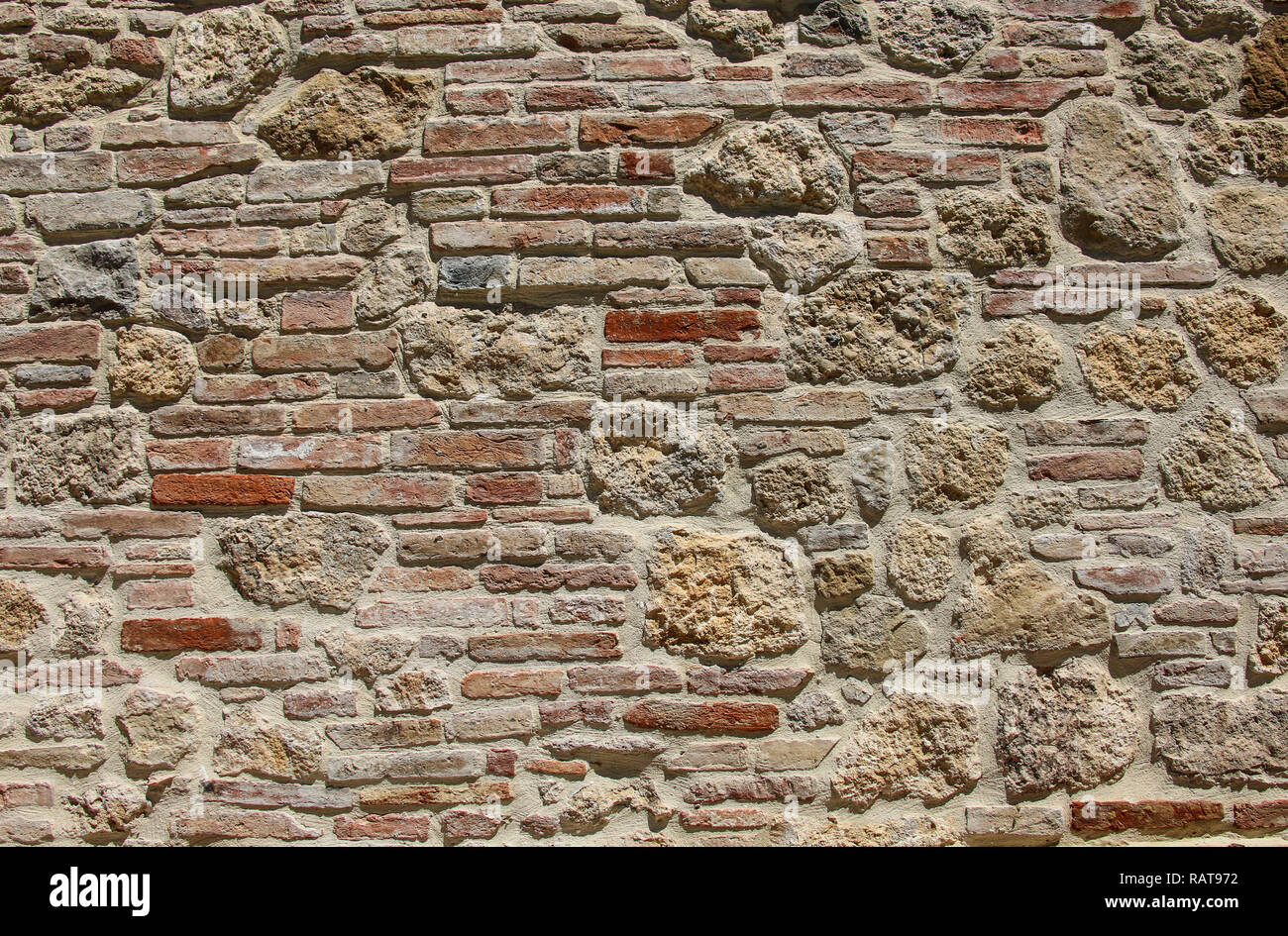 Brick wall red and yellow colors Stock Photo - Alamy
