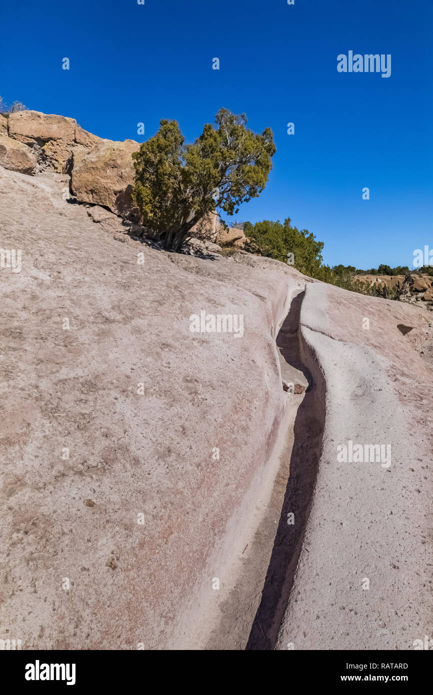 Trail cut into soft volcanic tuff rock by footwear through the years ...