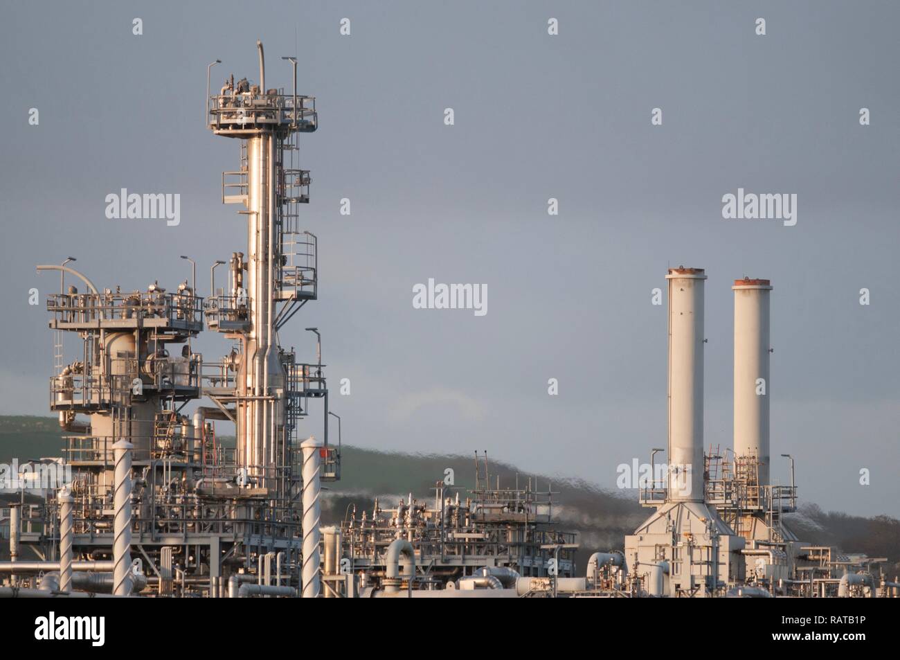 Oil refinery towers Stock Photo - Alamy