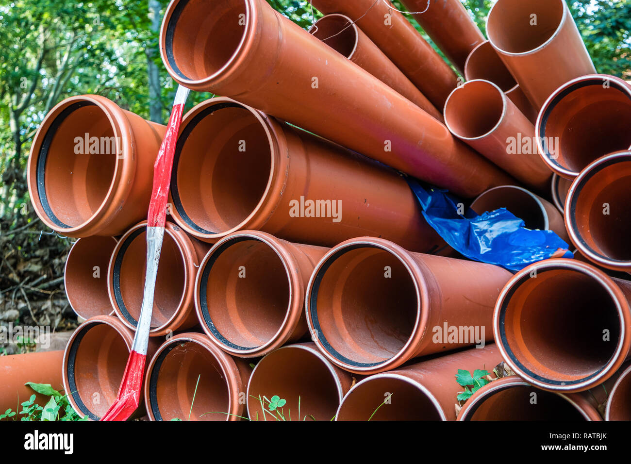 Sewer construction pipes Stock Photo - Alamy