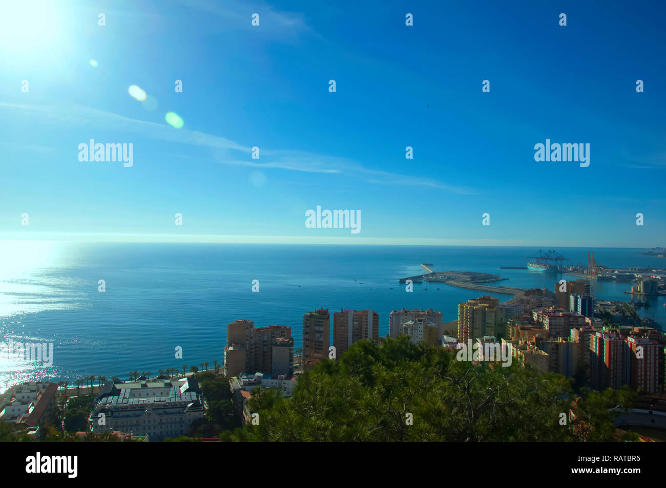View on the blue bay with houses and trees, mediterranean sea, Malaga ...
