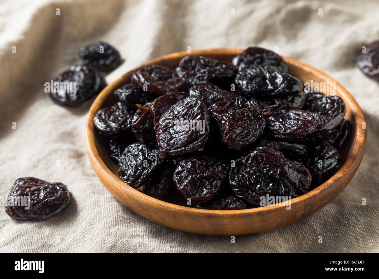 Raw Organic Dry Prunes in a Bowl Stock Photo - Alamy