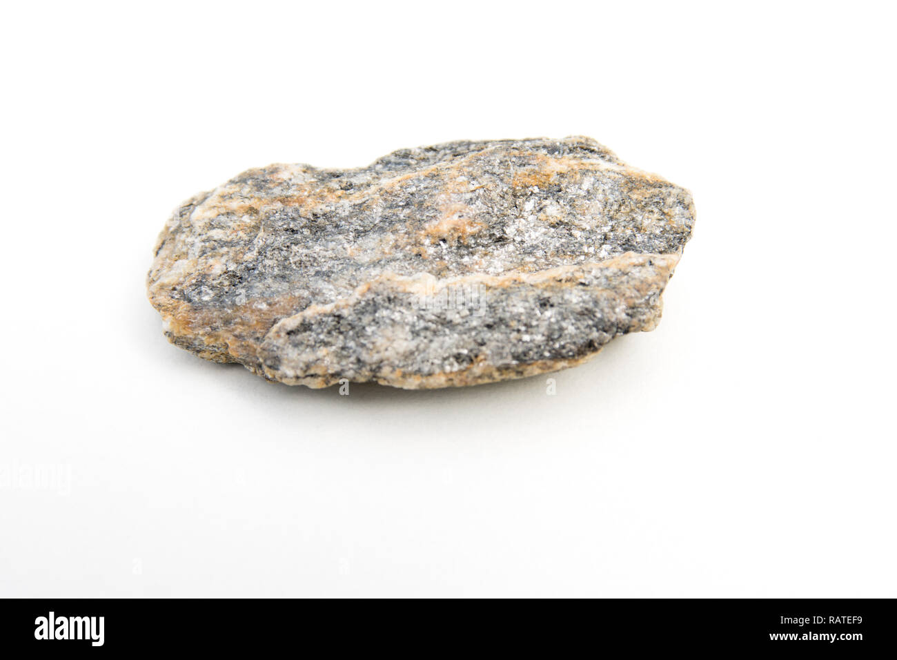 close up of gneiss stone isolated over white background Stock Photo - Alamy