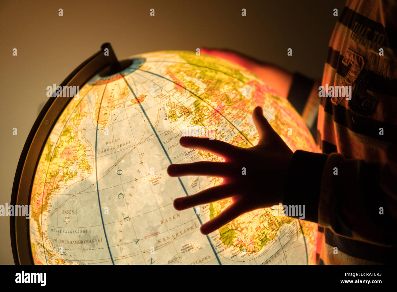 looking for a location on an earth model map Stock Photo - Alamy