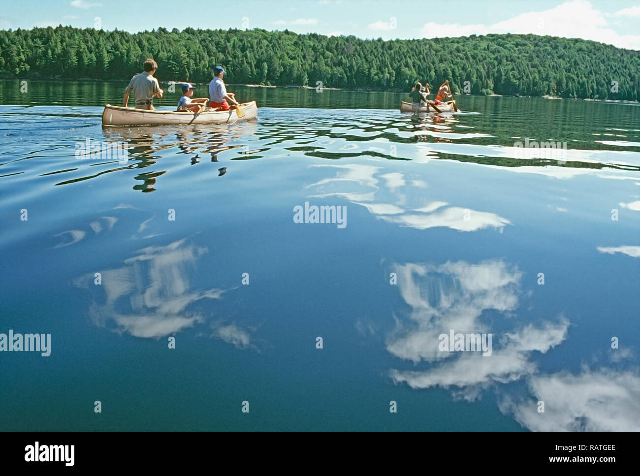 People canoeing in lake Stock Photo - Alamy
