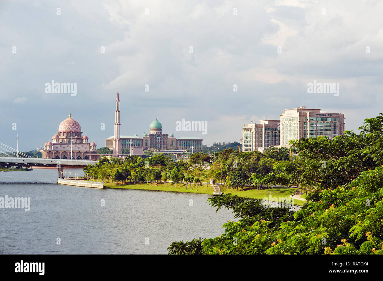 Situated next to a lake, Putra Mosque is modelled after Persian Islamic ...