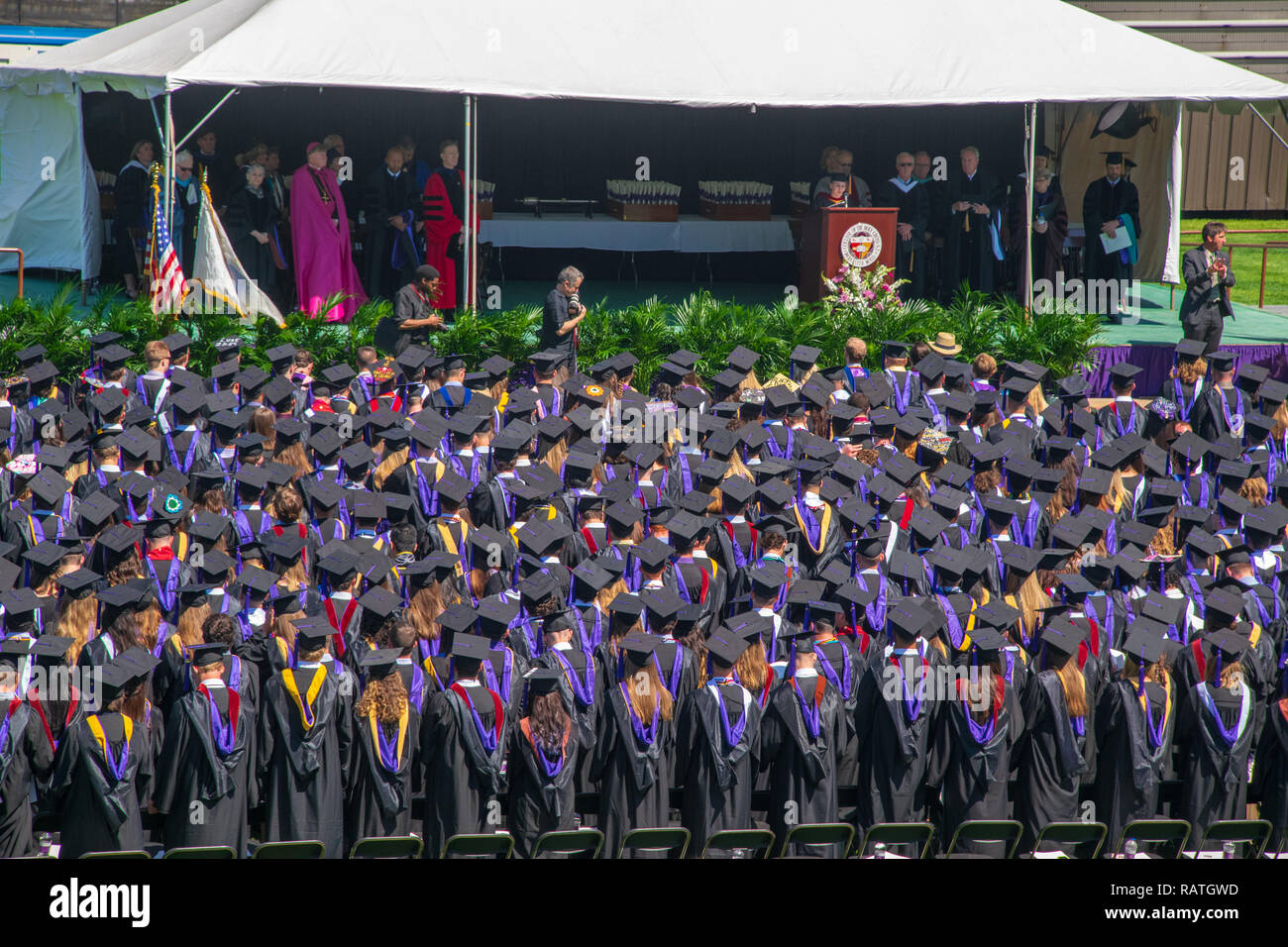 Worcester, Massachusetts--May 22, 2015. Graduating seniors stand ...