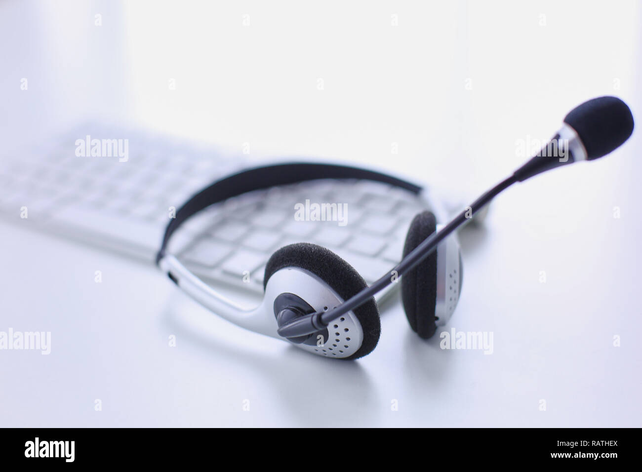 Call center and customer service help desk. VOIP headset on laptop ...