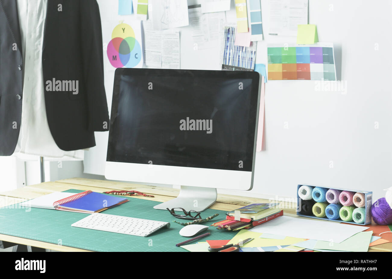 Empty workroom and workplace of tailor or vendor of clothes in small ...