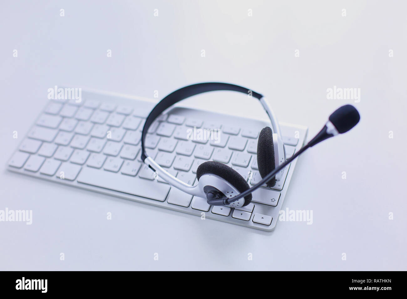 Call center and customer service help desk. VOIP headset on laptop ...