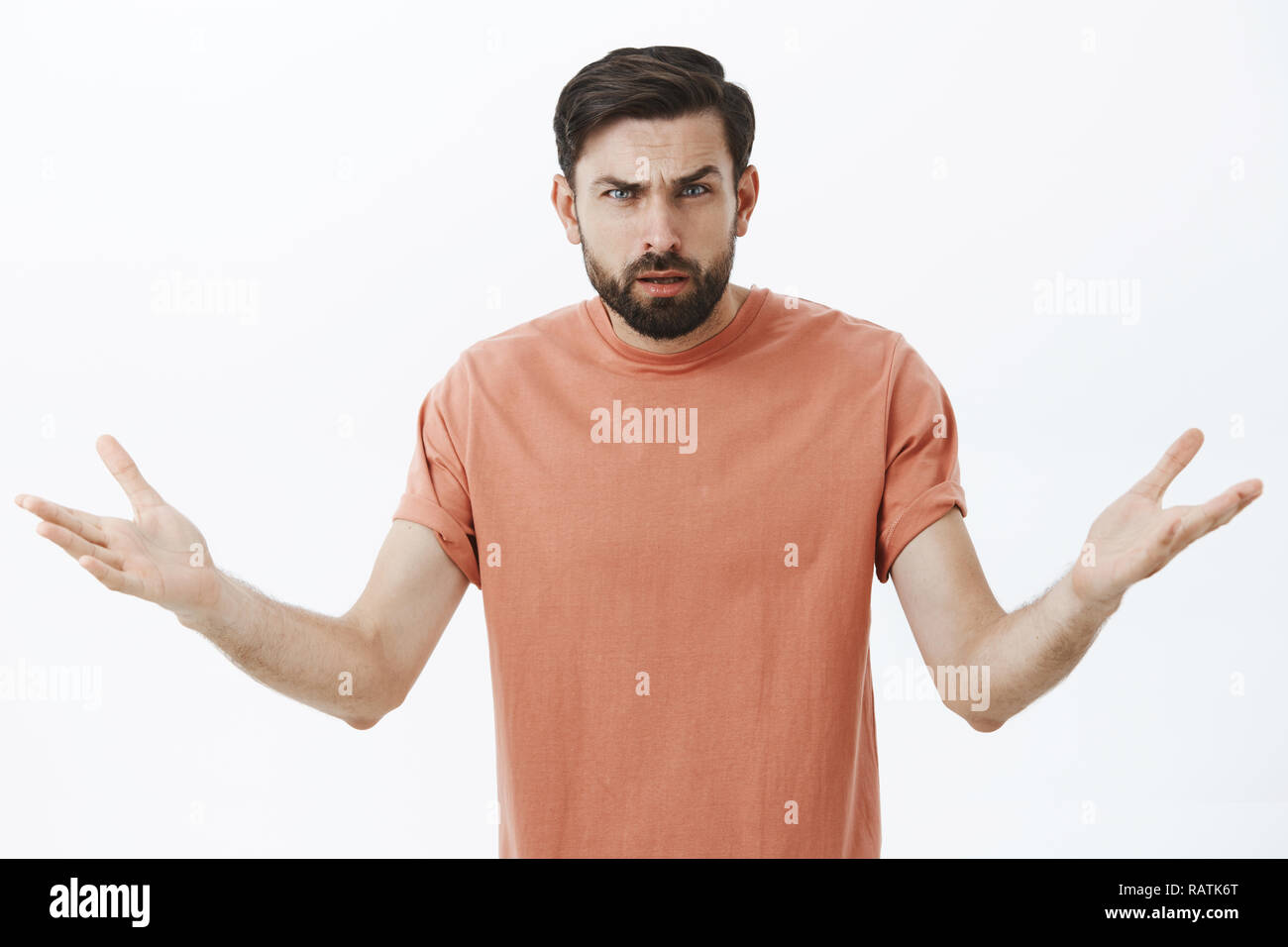 Confused and annoyed angry bearded boyfriend cannot understand why ...