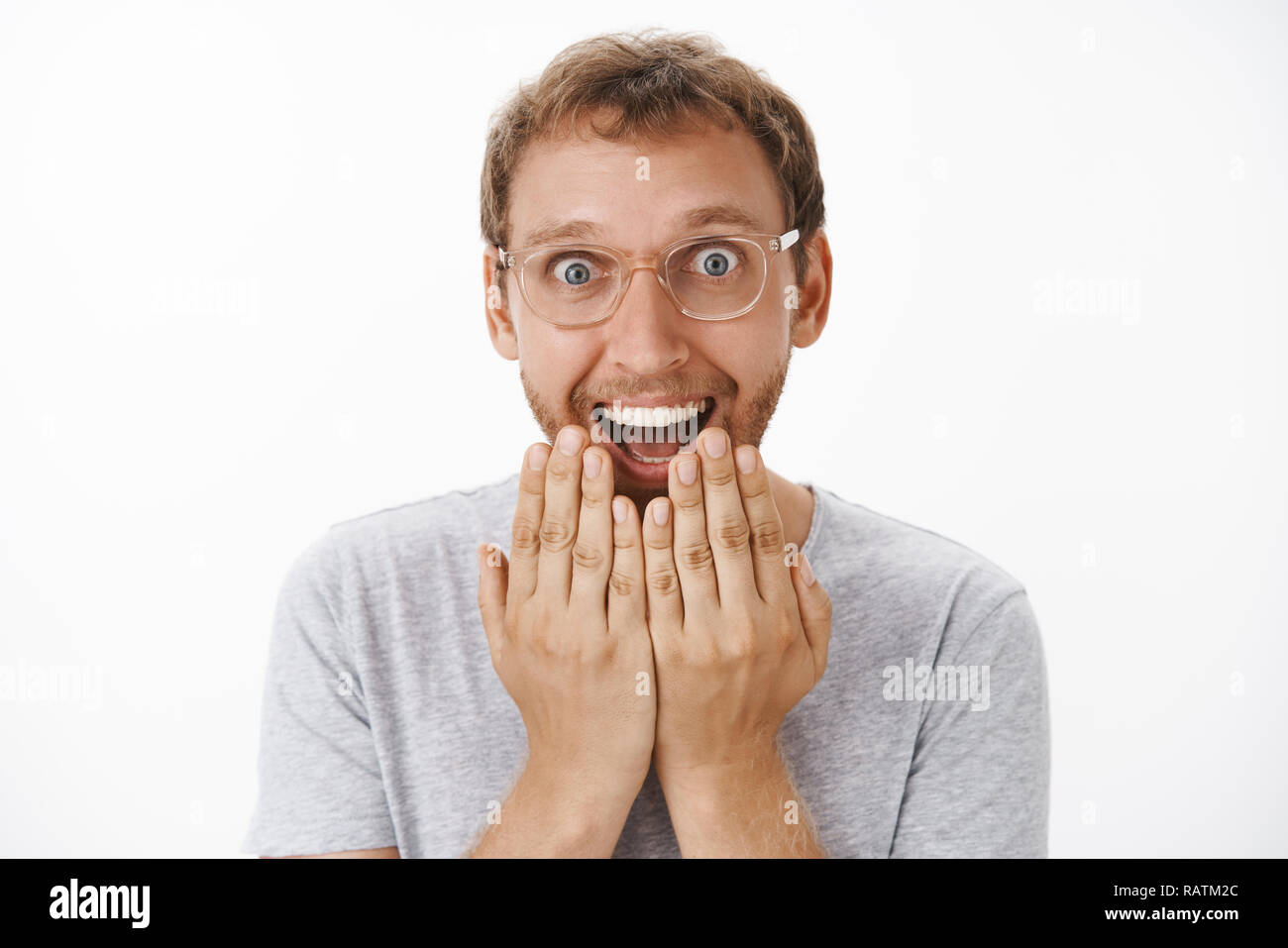 Man cannot hide happiness and excitement receiving awesome news holding ...