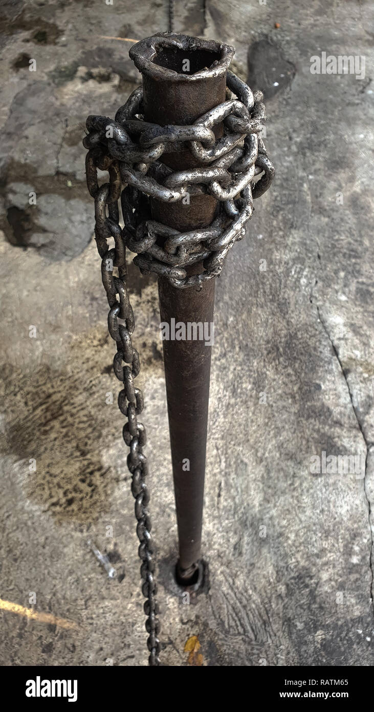 Old Chain on the Pole Stock Photo - Alamy