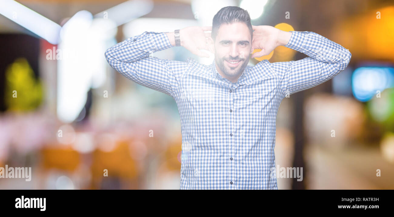 Male model arms behind head hi-res stock photography and images - Alamy