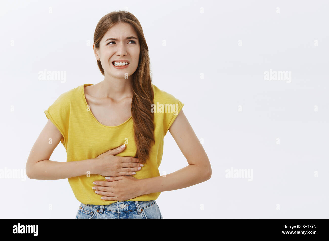 Girl stooping hi-res stock photography and images - Alamy