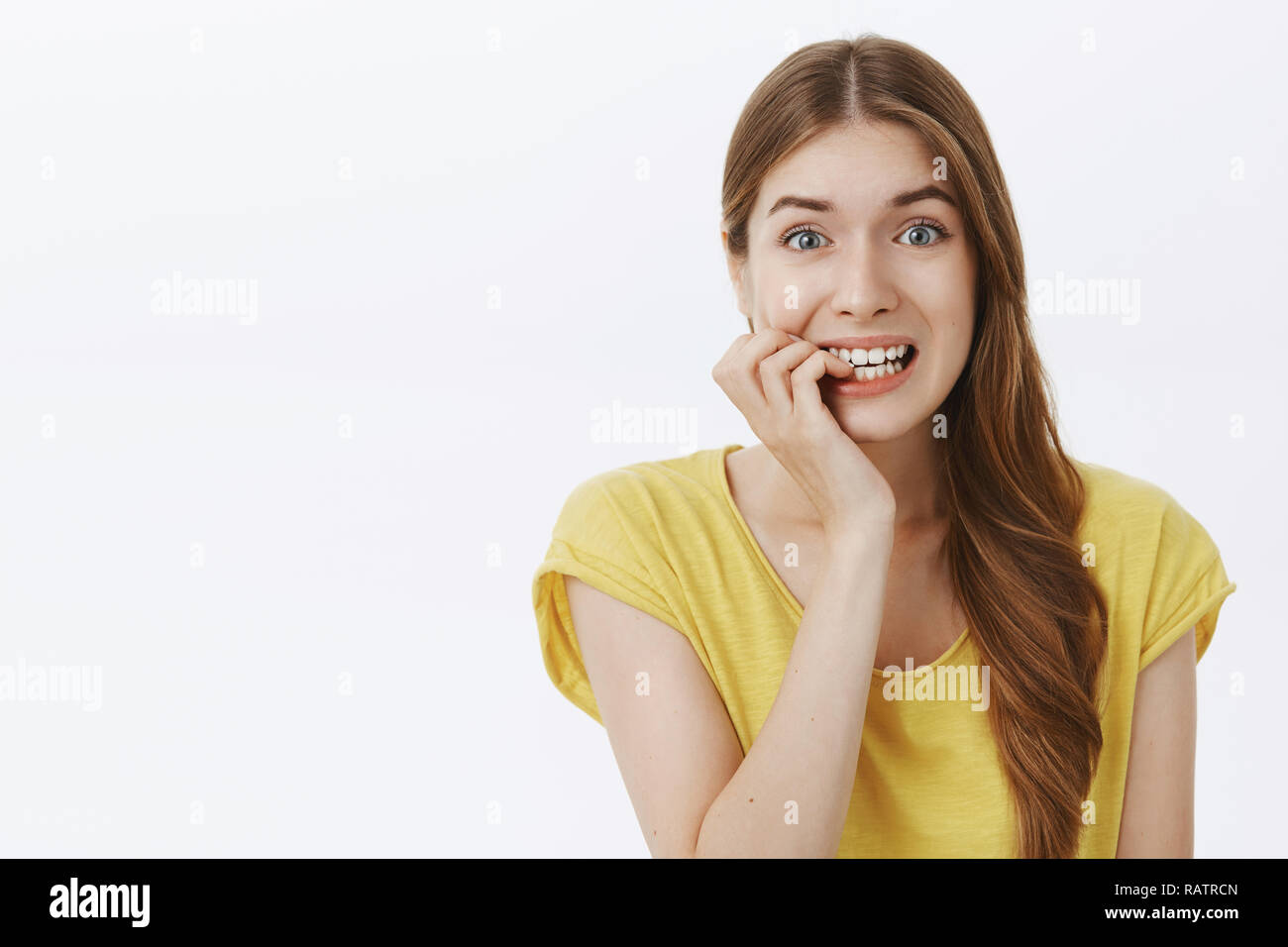 Woman messed up feeling worried someone see her mistake biting fingers ...