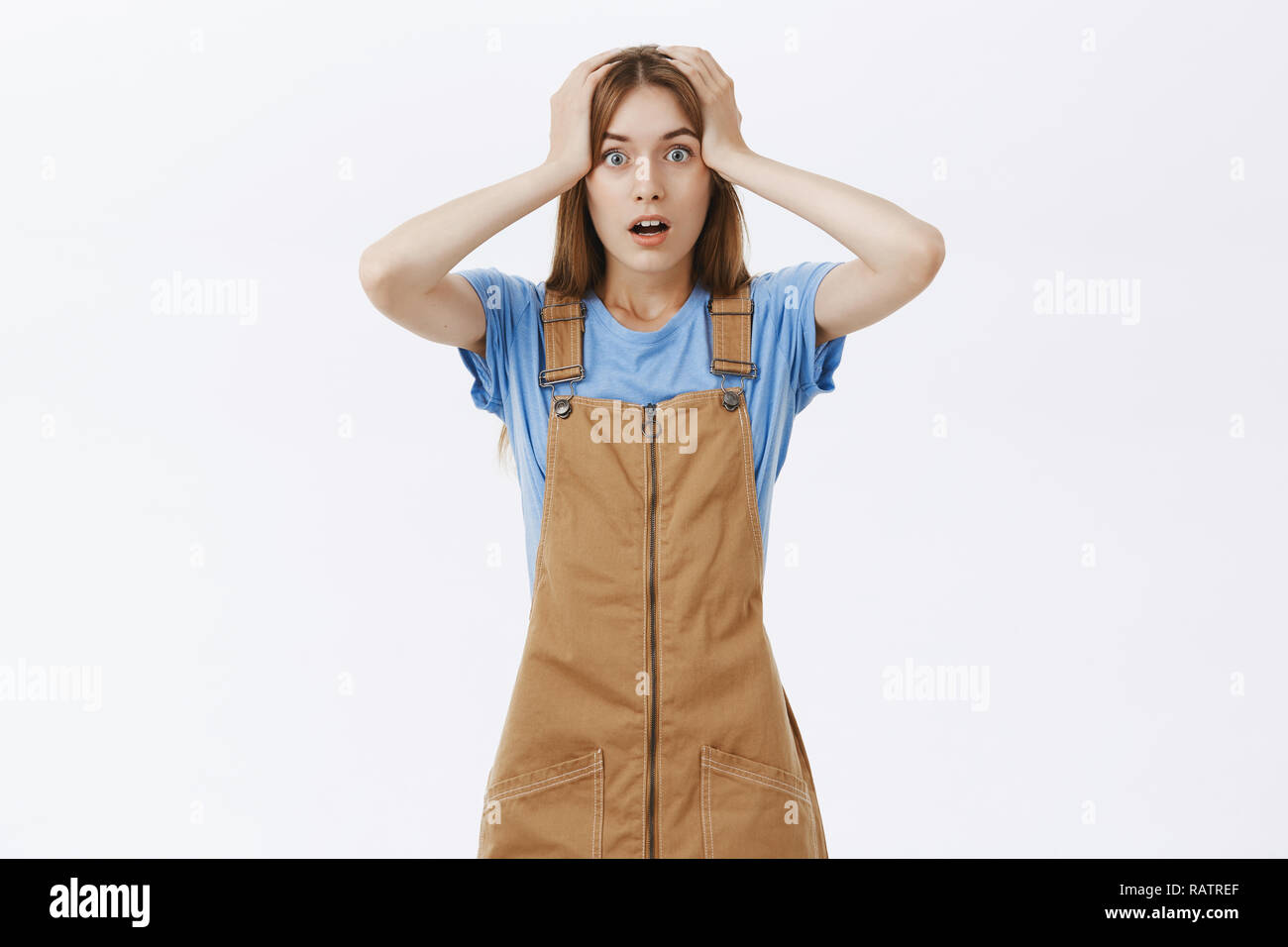 Young woman hands grabbing head hi-res stock photography and images - Alamy