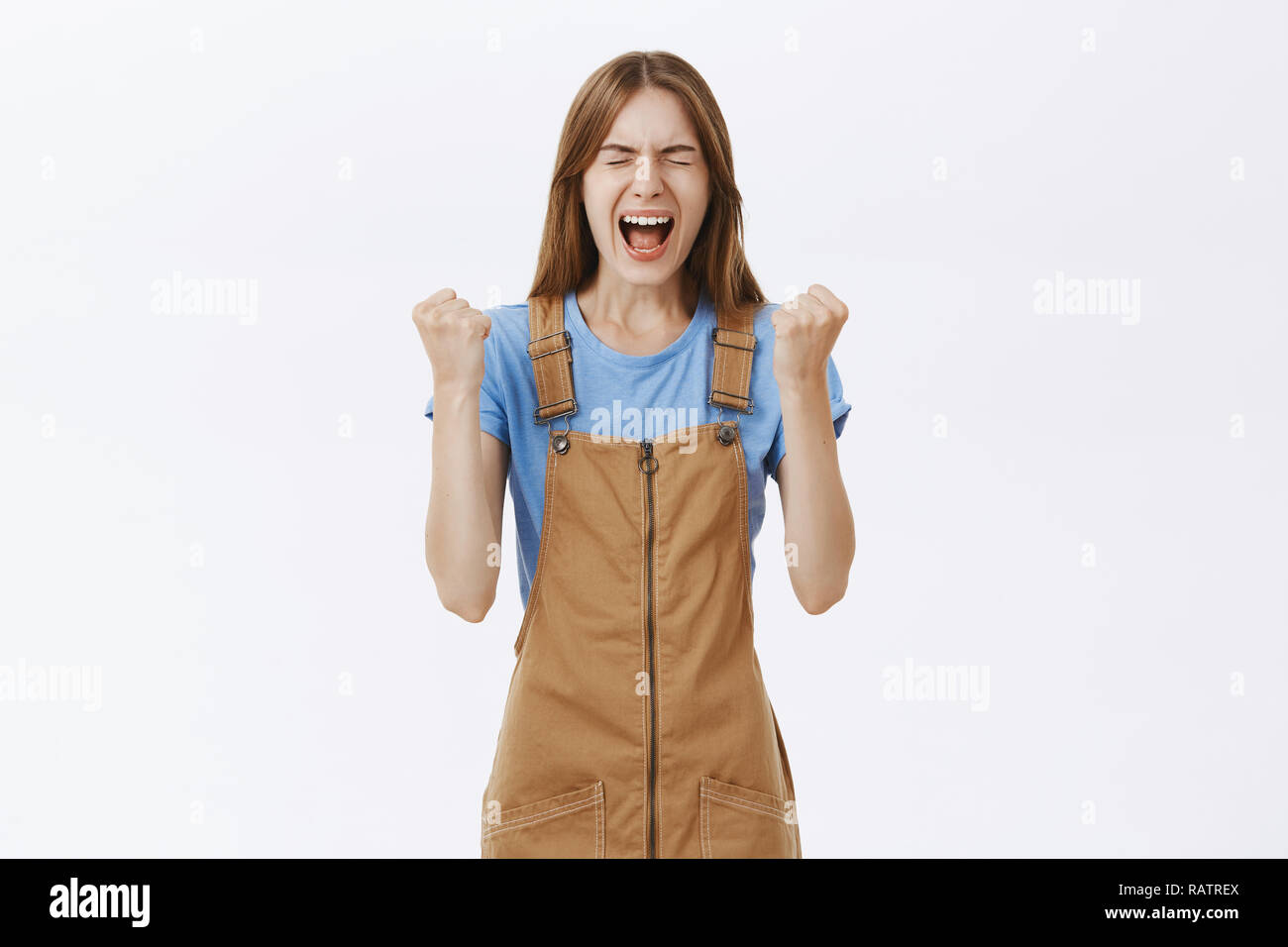 Girl finally achieved perfect result yelling from joy and happiness ...