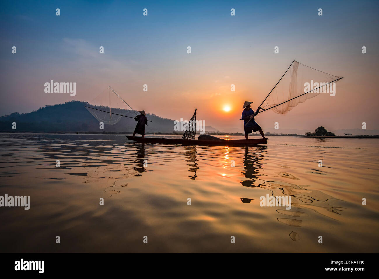 Man throwing cast net on hi-res stock photography and images - Alamy