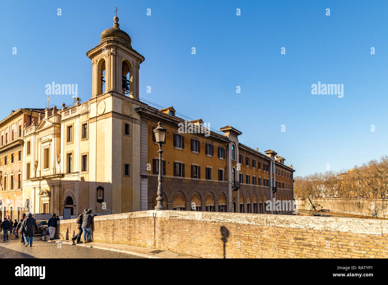 ROME, ITALY - JANUARY 4, 2019: tourists walking on Pons Fabricius, the ...