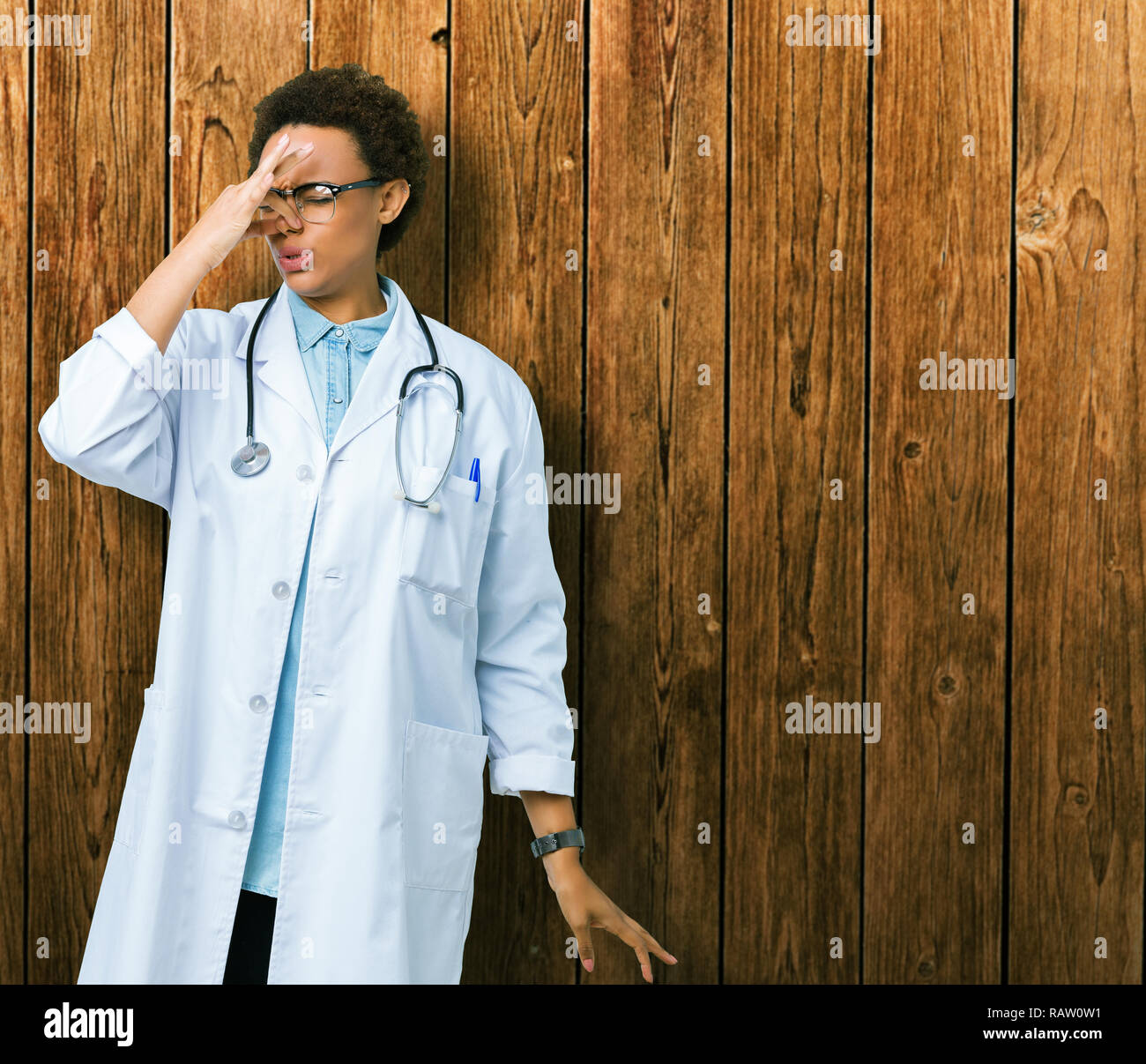 African american woman doctor smelling hi-res stock photography and ...