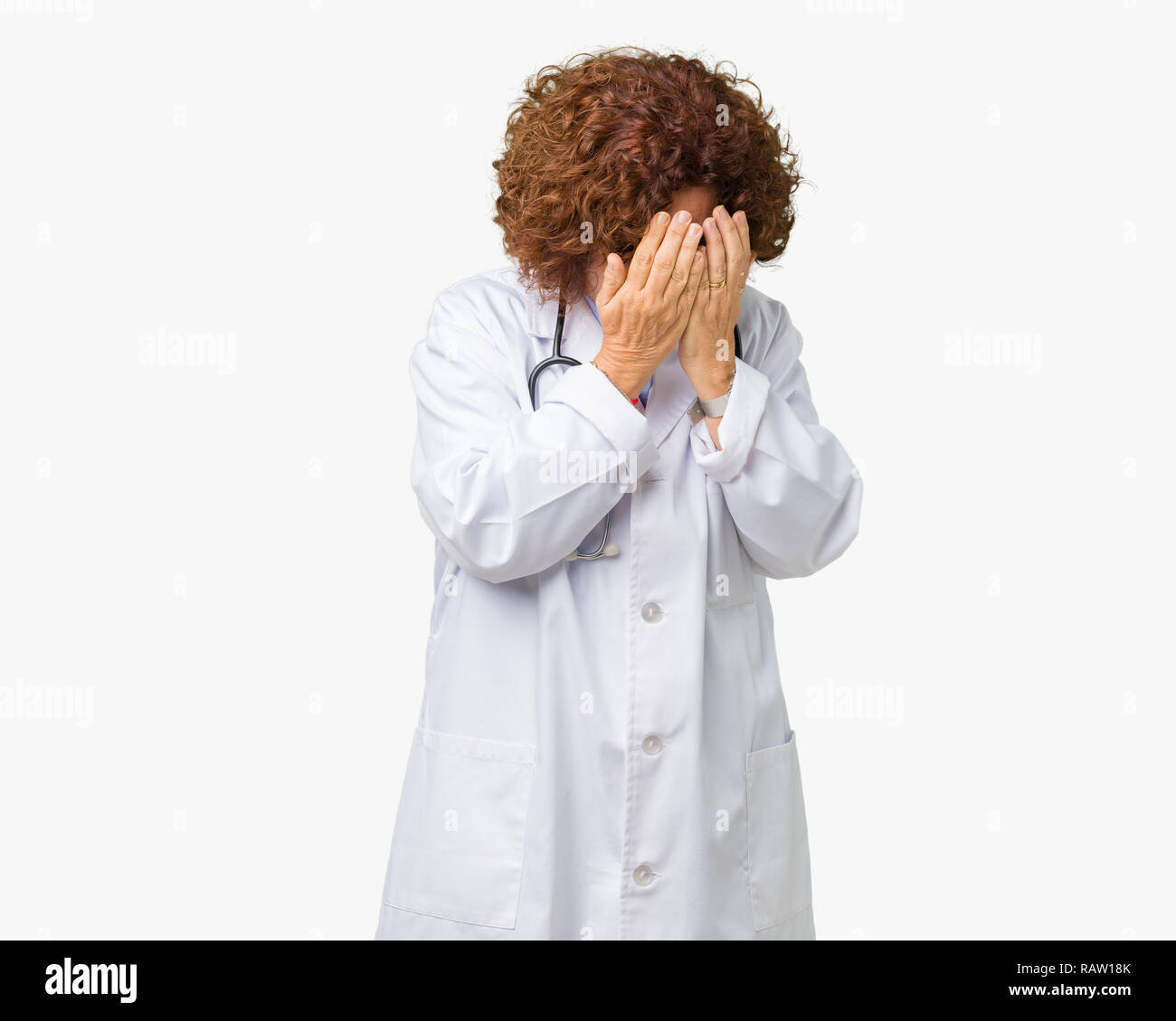 Middle ager senior doctor woman over isolated background with sad ...
