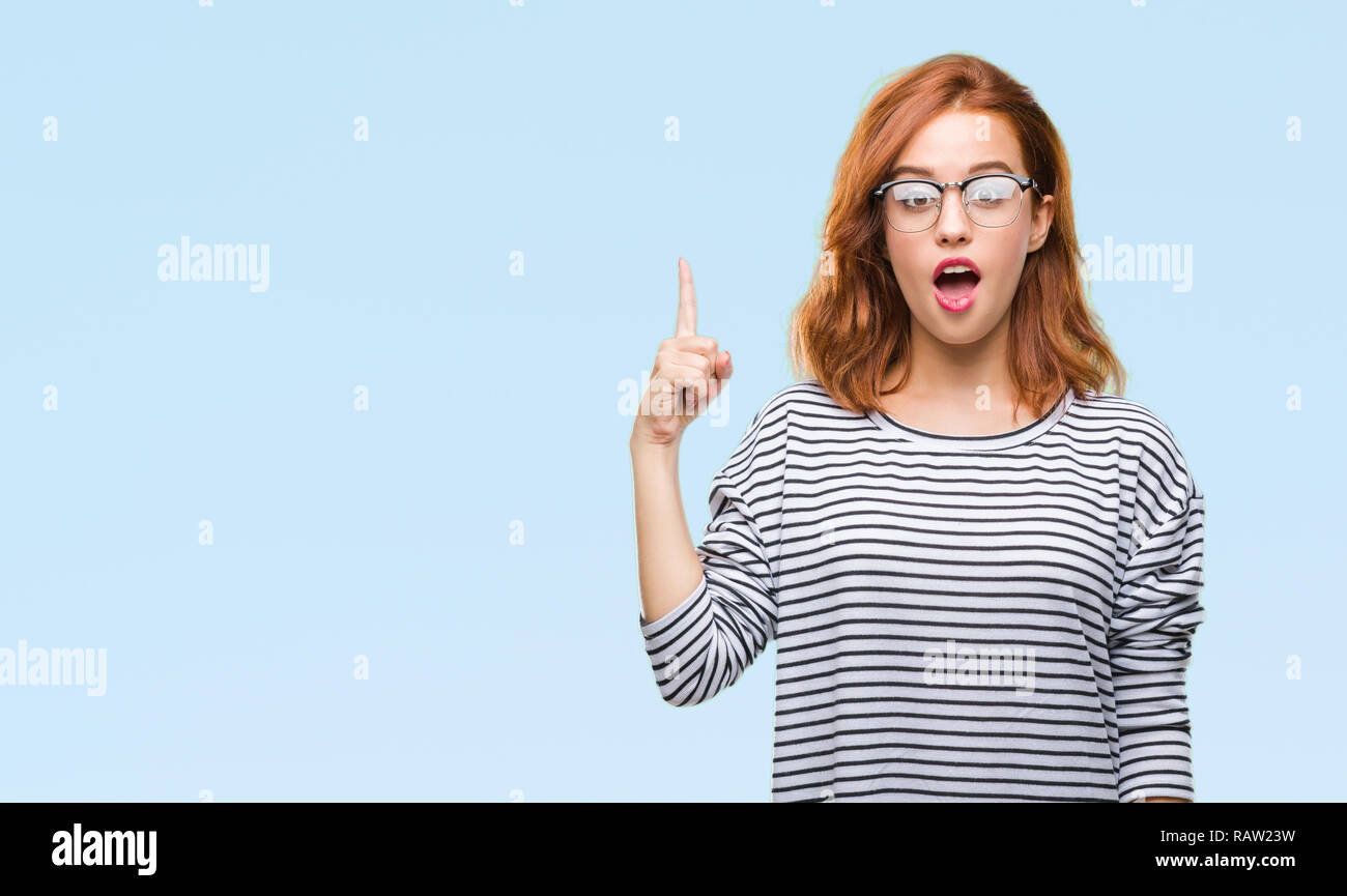 Young Beautiful Woman Over Isolated Background Wearing Glasses Pointing