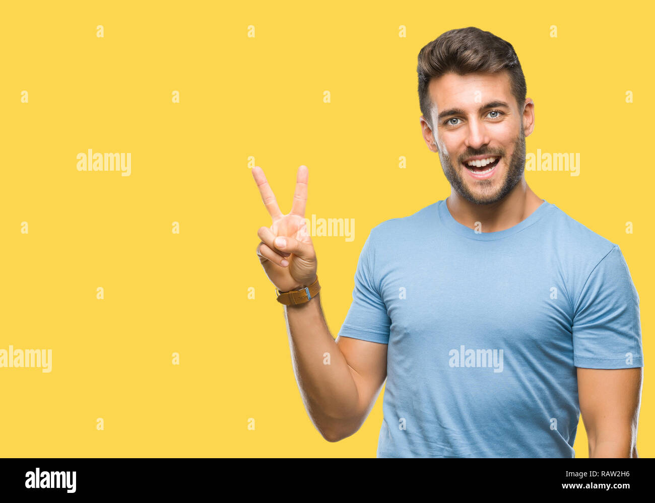 Young handsome man over isolated background smiling with happy face ...