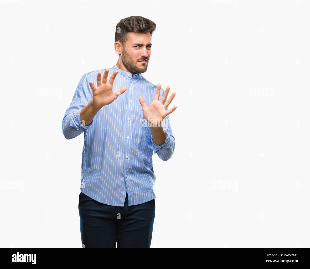 Young handsome man over isolated background disgusted expression ...