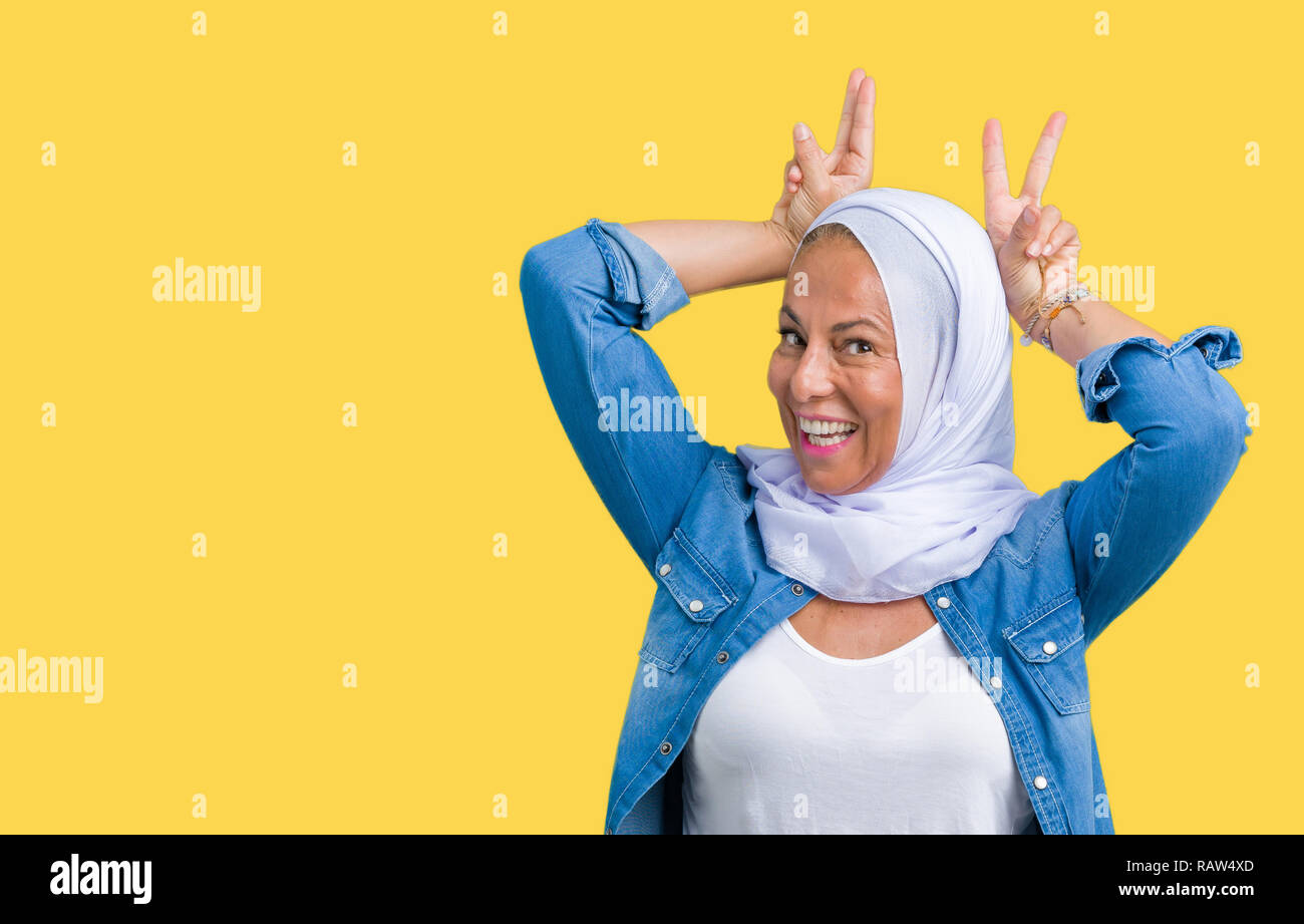 Middle age eastern arab woman wearing arabian hijab over isolated ...