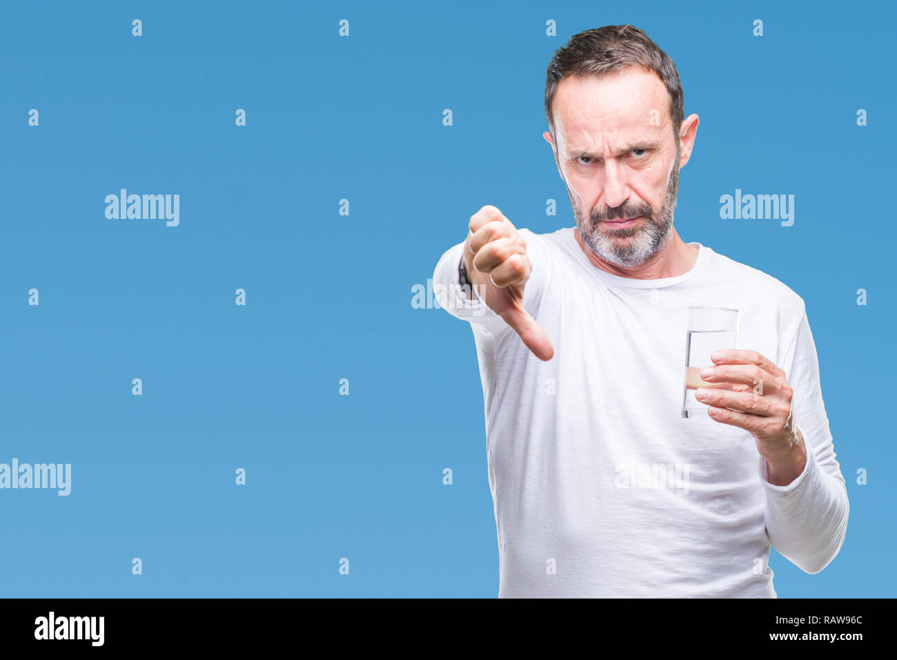 Middle age hoary senior man drinking glass of water over isolated ...