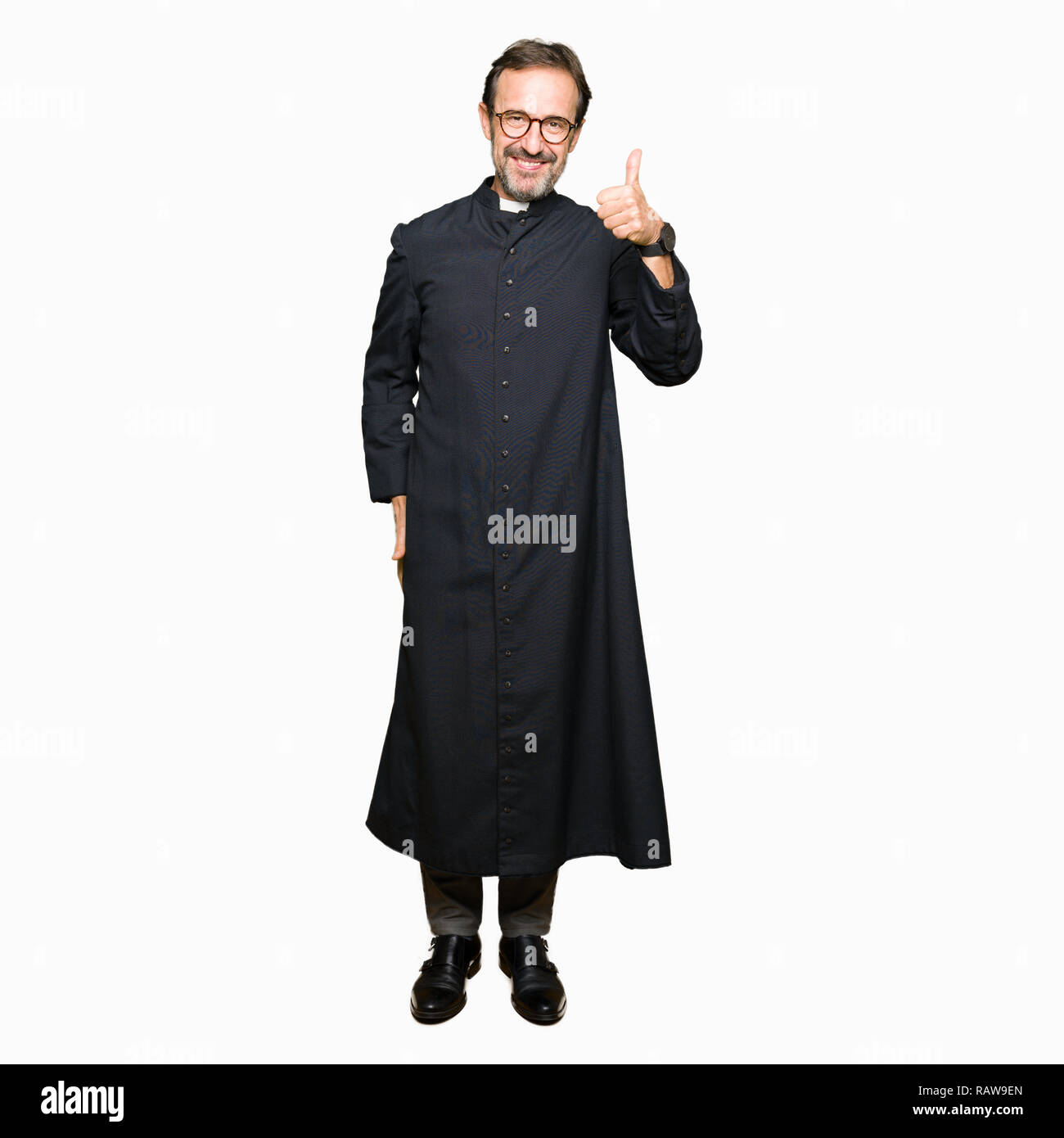 Priest looking up isolated Cut Out Stock Images & Pictures - Alamy