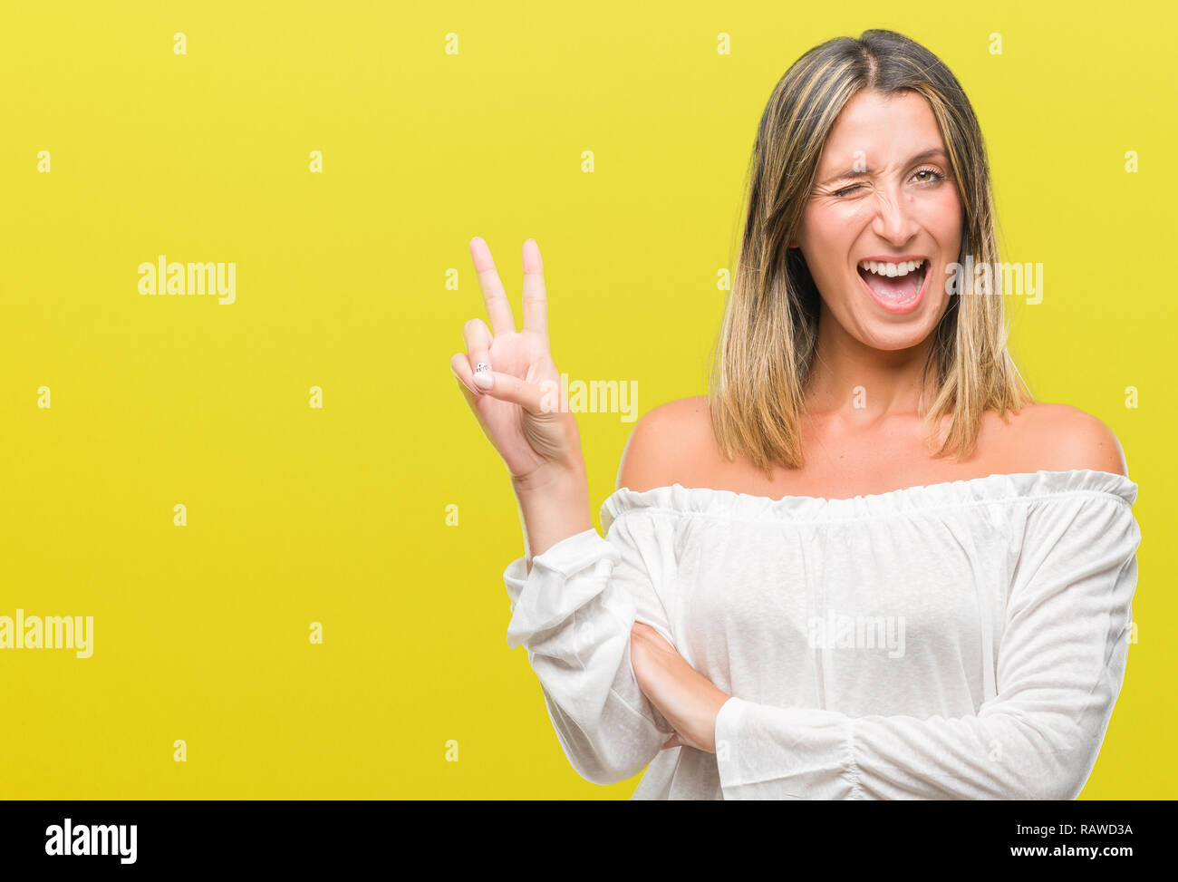 Hispanic beautiful woman winking face hi-res stock photography and ...